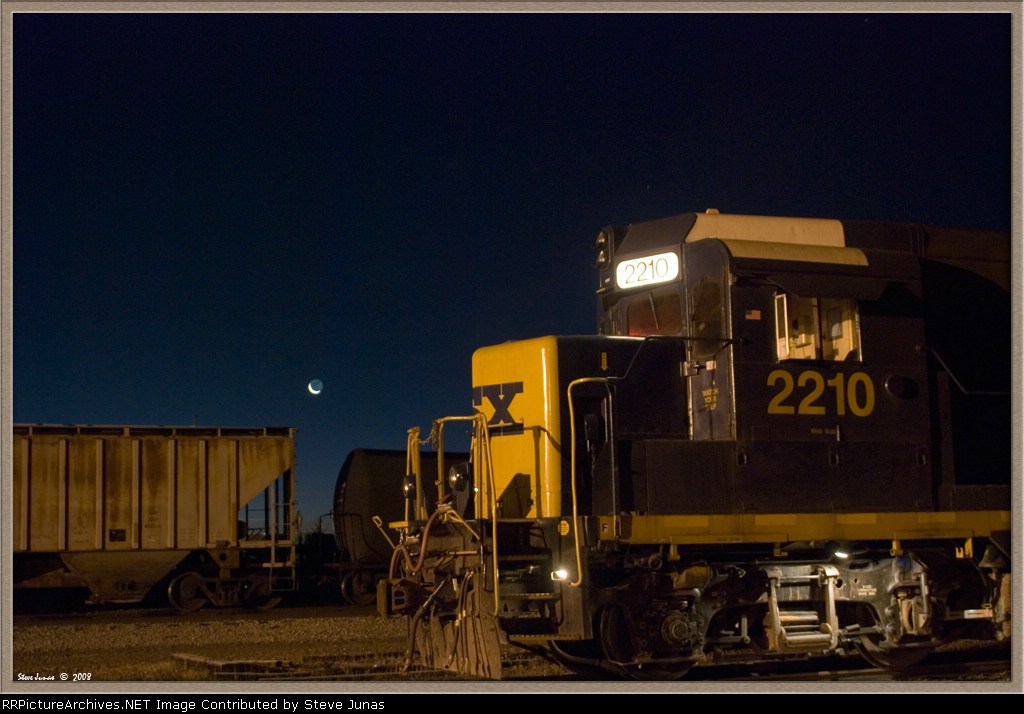 CSX 2210 waits for morning as the moon rises